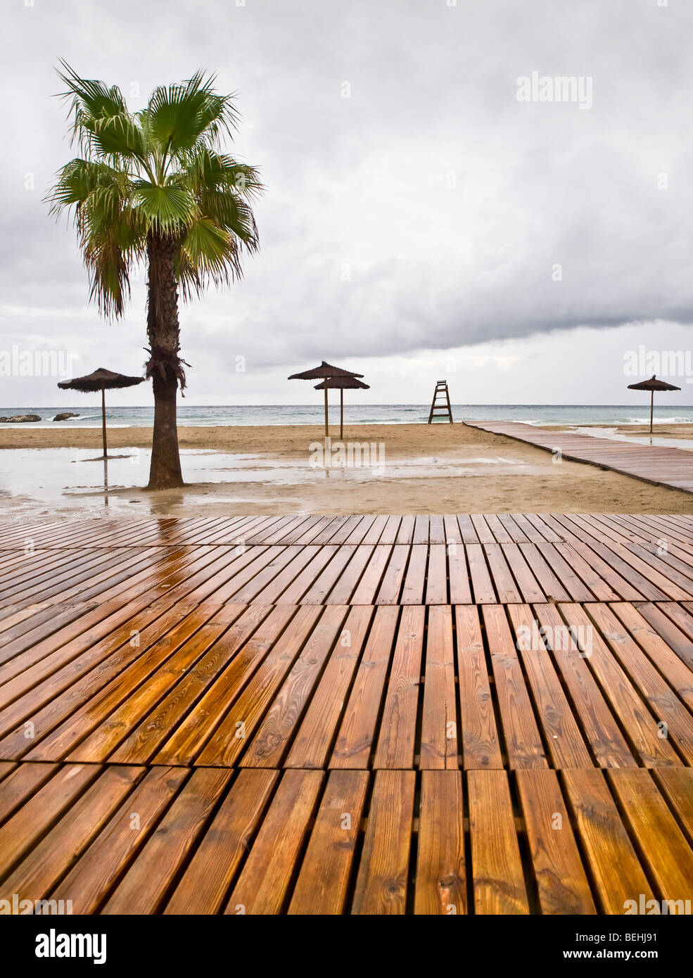 Empty beach in a rainy day. End of summer season Stock Photo - Alamy