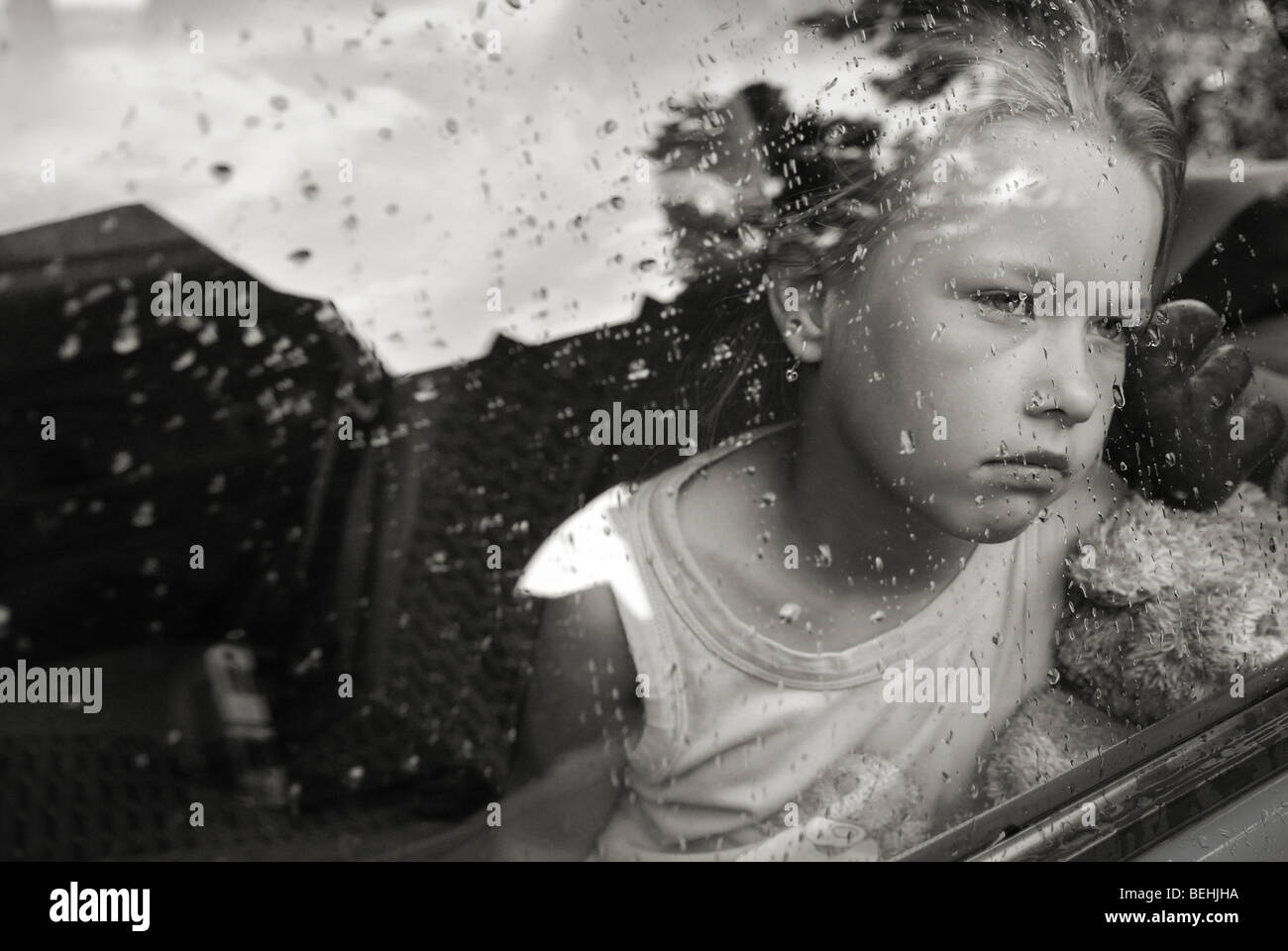 Sad Little Girl In The Rain