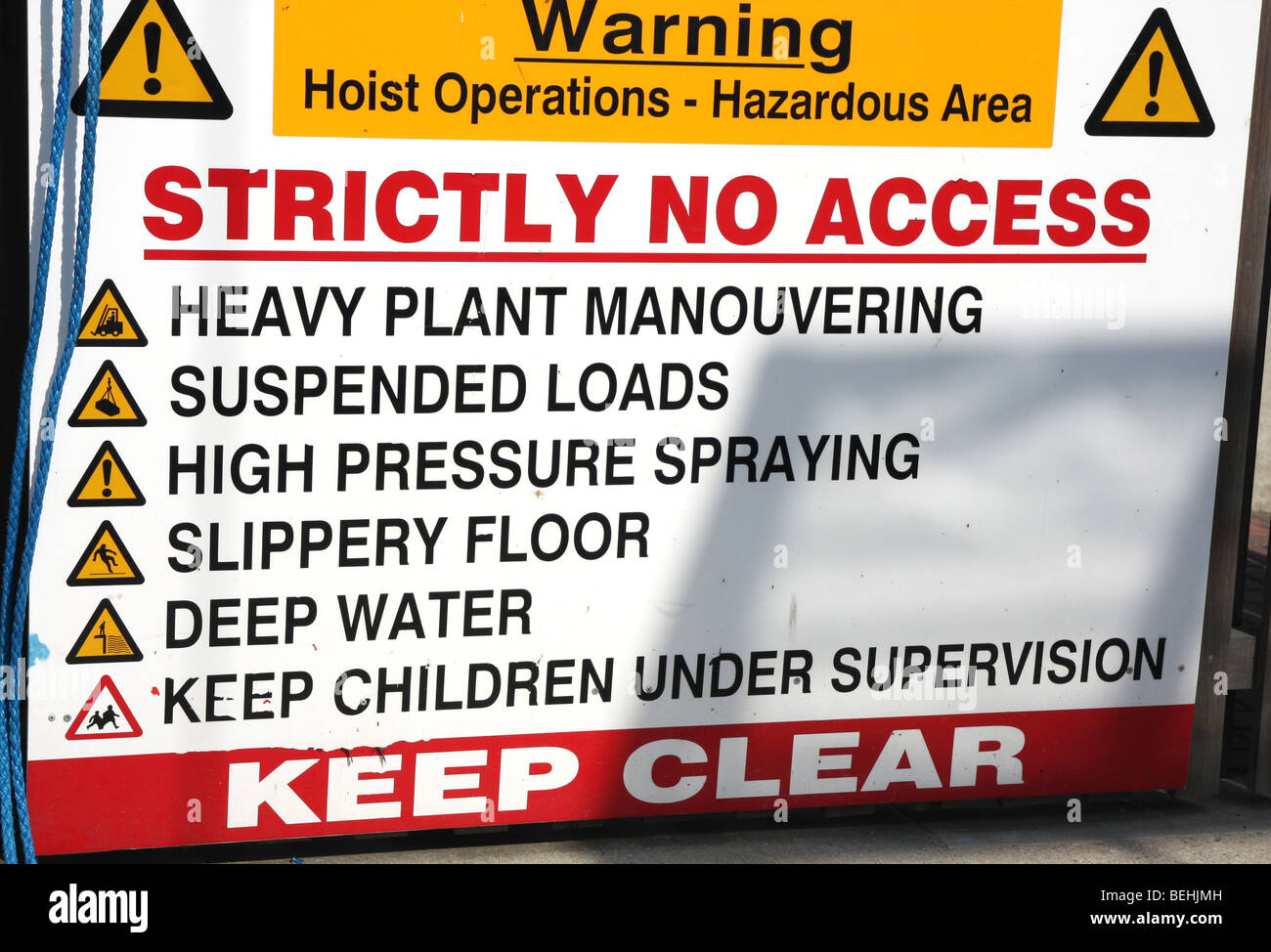 A sign warning of dangers Stock Photo - Alamy