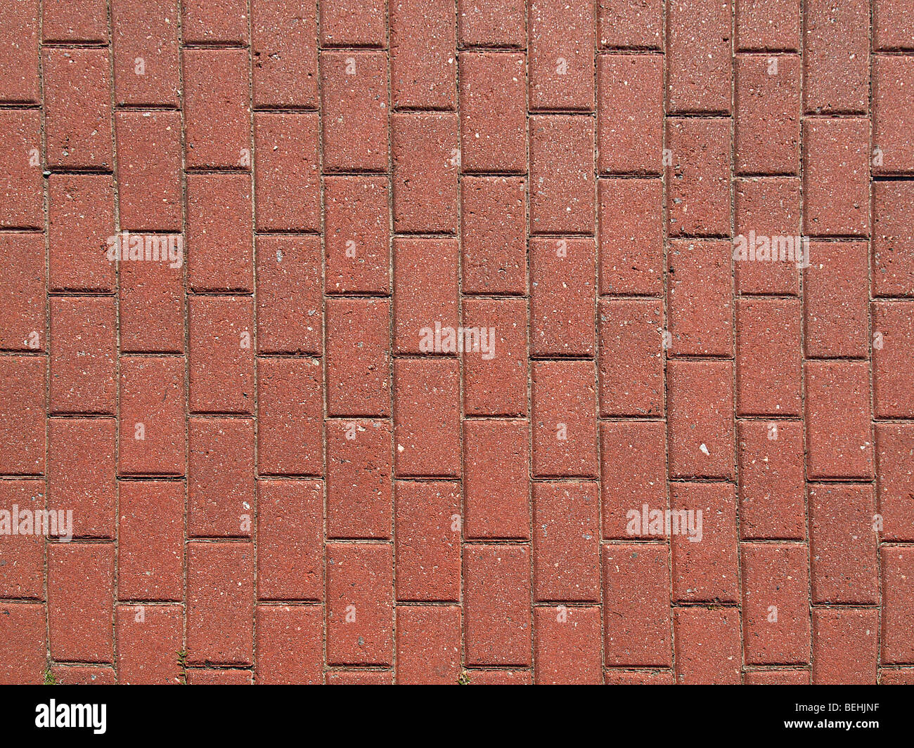 Closeup of the pattern of a red brick paved walkway Stock Photo - Alamy