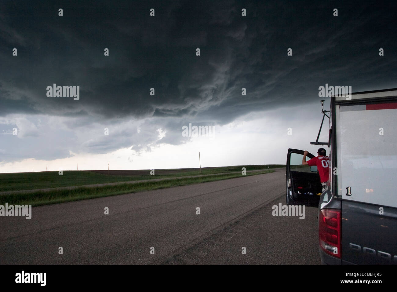 Storm chasers with Project Vortex 2 watch a funnel cloud form in Goshen ...