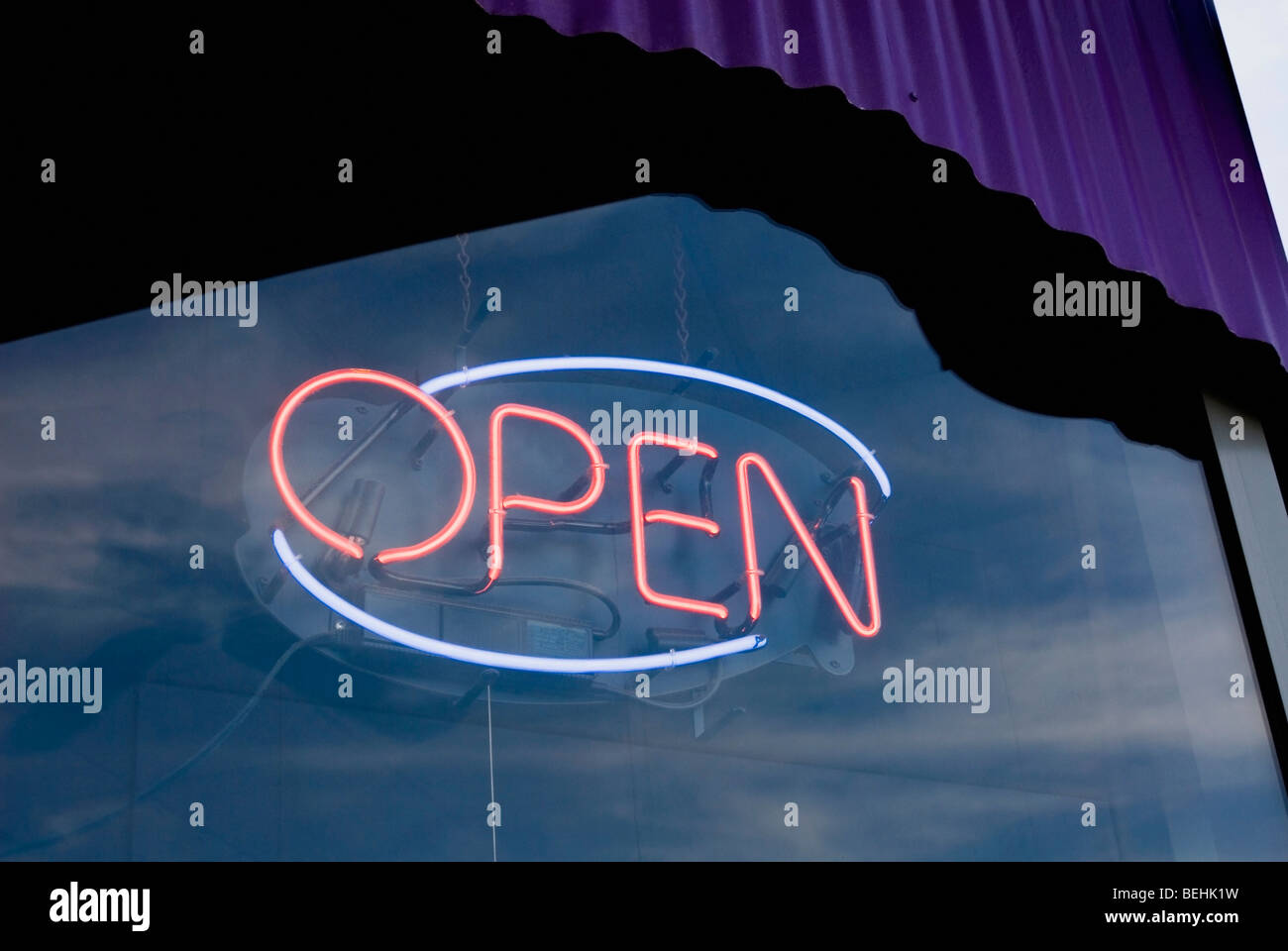 Open sign in window Stock Photo - Alamy