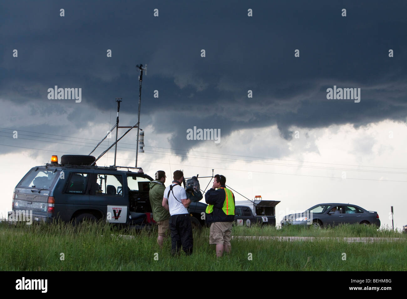 Storm chasers with Project Vortex 2 watch a funnel cloud form in Goshen ...