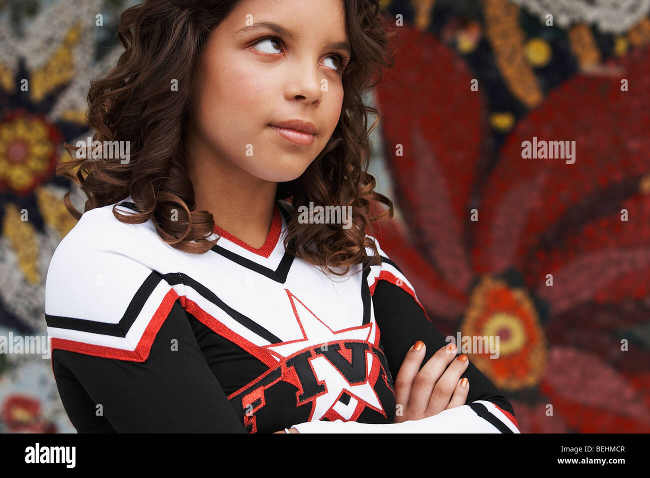 Close-up of a girl thinking with her arms crossed Stock Photo - Alamy