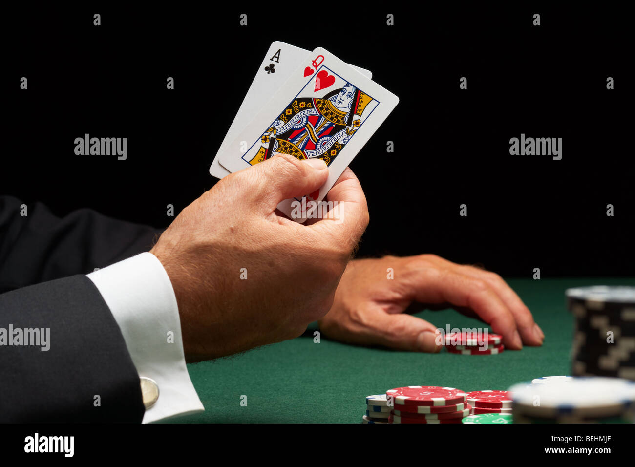 Playing cards ace hand sleeve hi-res stock photography and images - Alamy