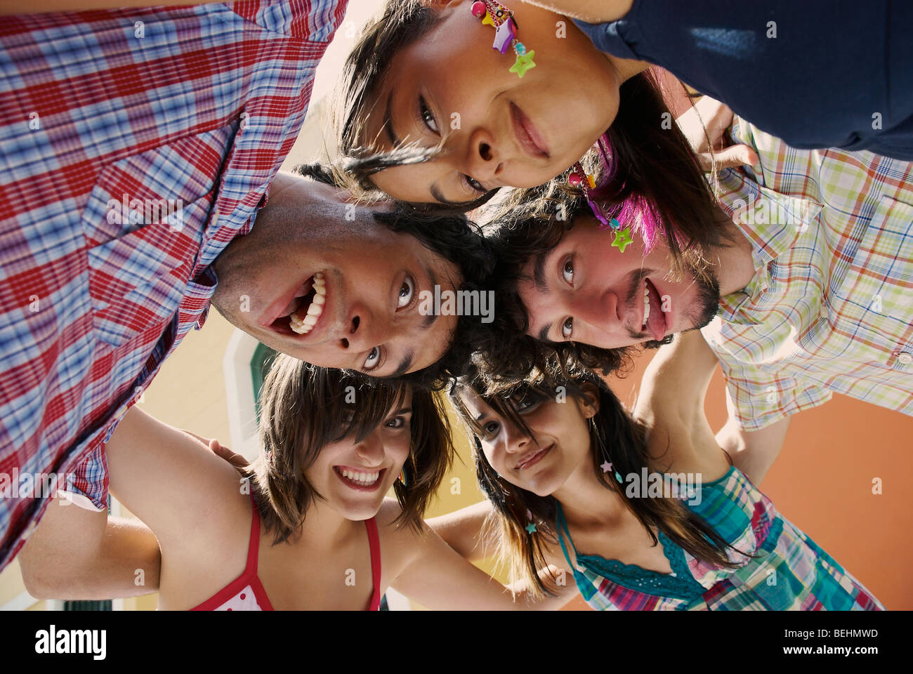 Five women standing in circle hi-res stock photography and images - Alamy