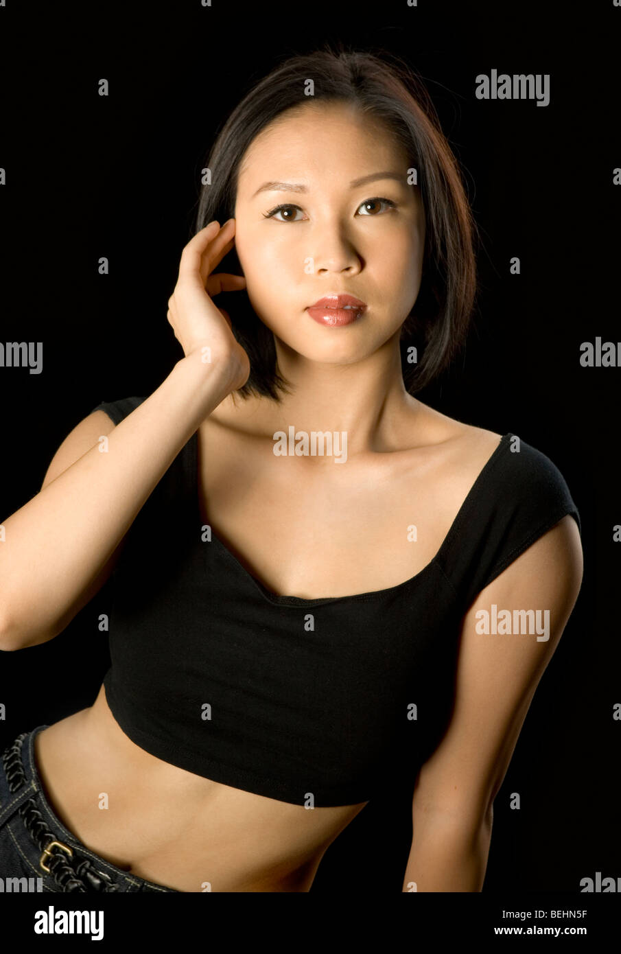 asian girl low key portrait Stock Photo - Alamy