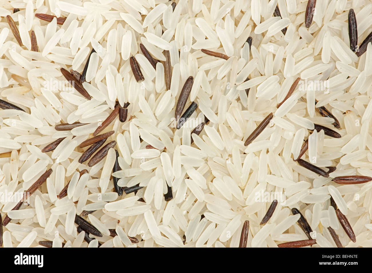 Background of brown rice (long grain Stock Photo - Alamy