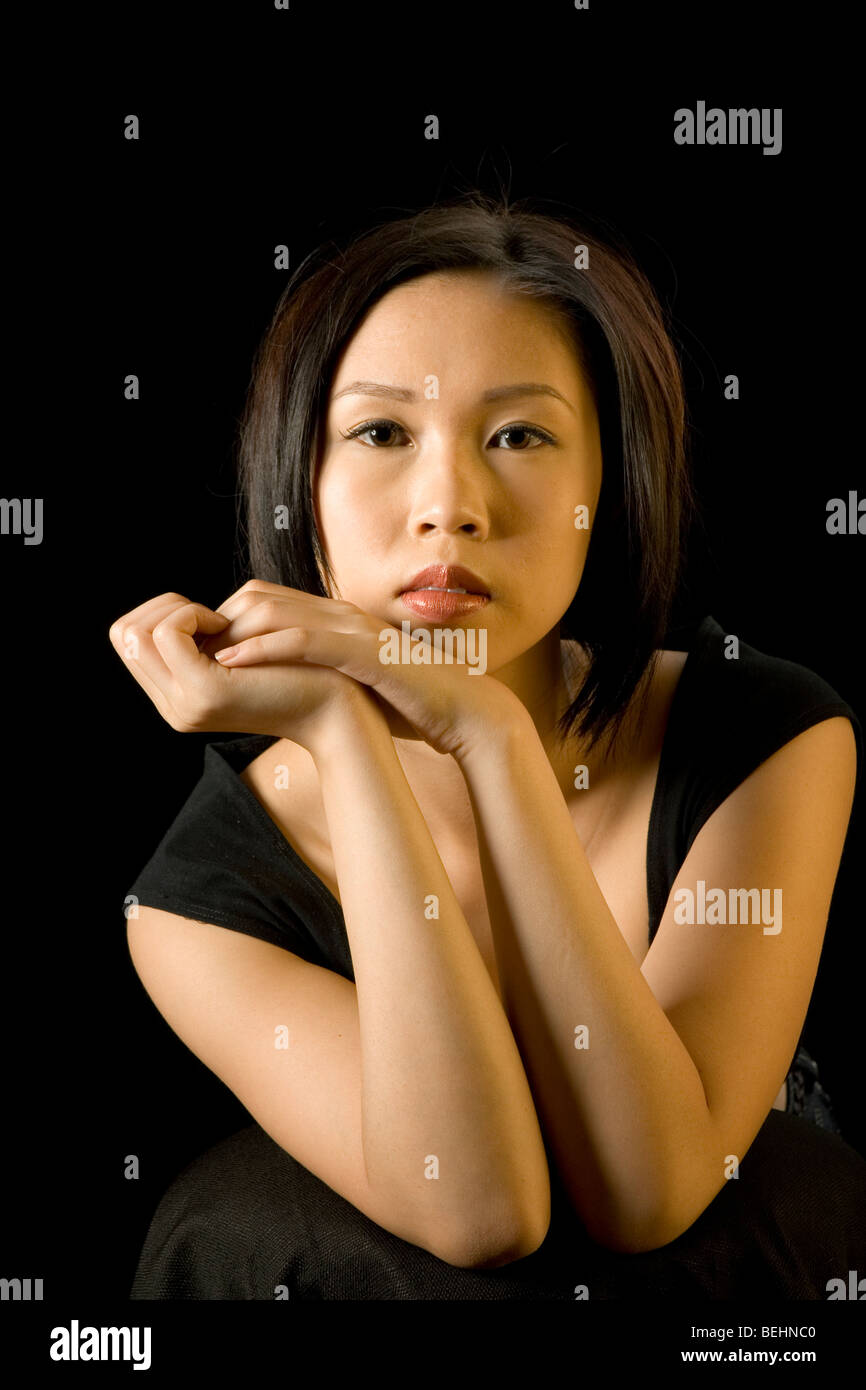 Asian girl low key portrait hi-res stock photography and images - Alamy