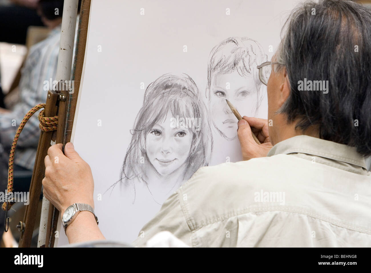 Street artist drawing in Montmartre District, Paris, France Stock Photo ...