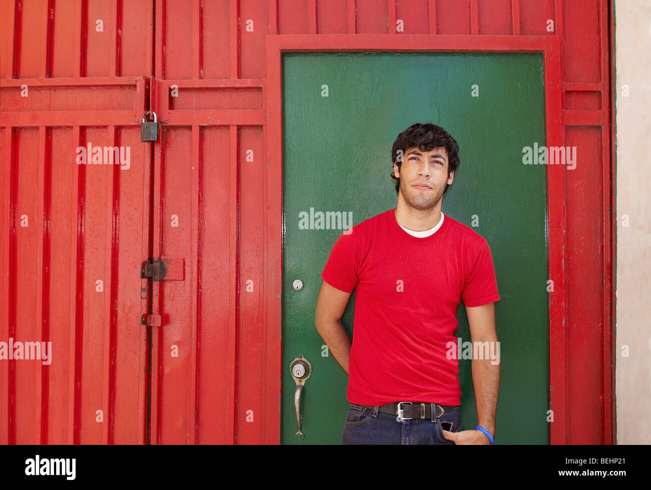 Man standing in front of metal gate hi-res stock photography and images ...