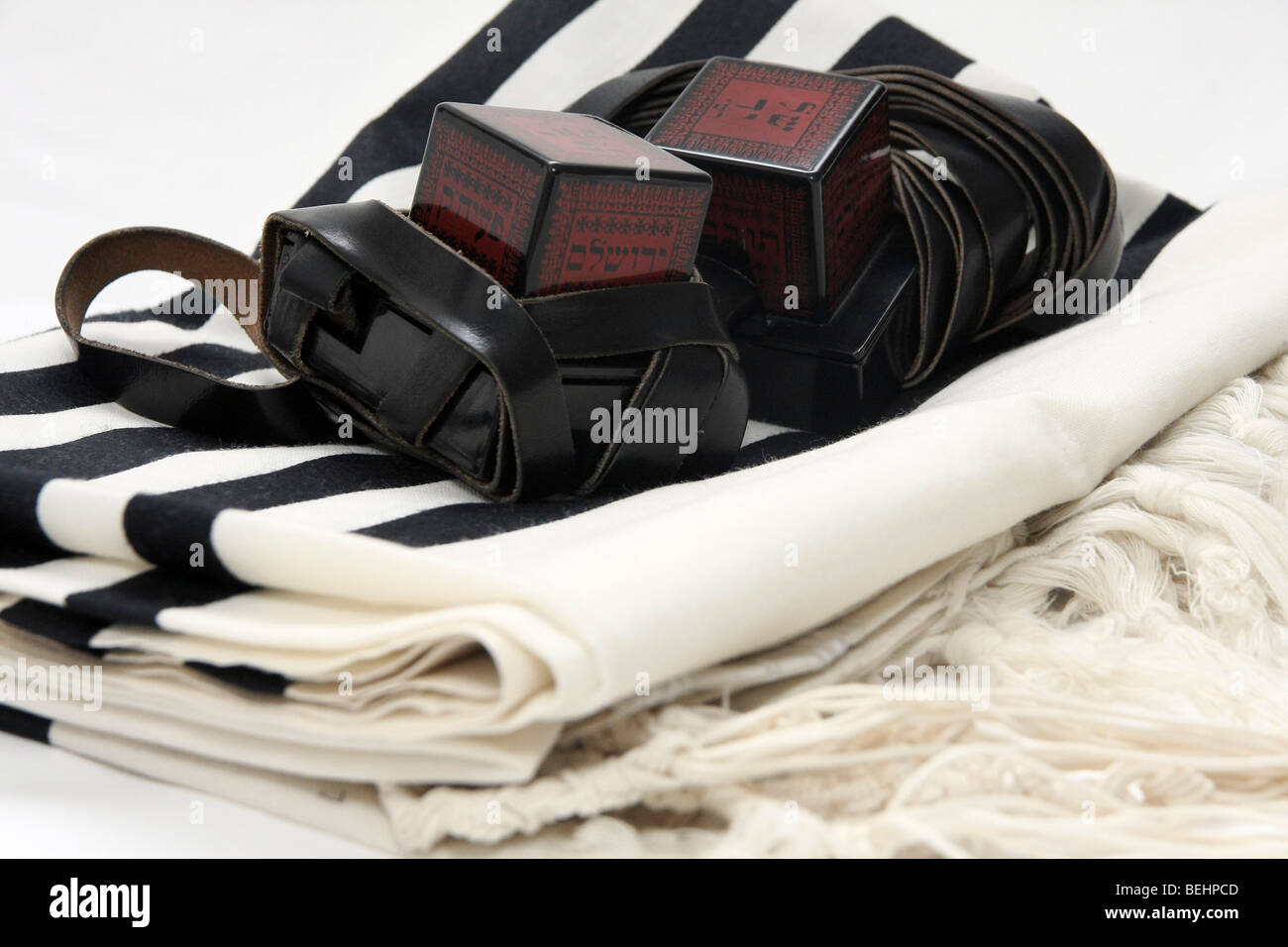 Cutout of Tifillin and Talit on white background Stock Photo - Alamy