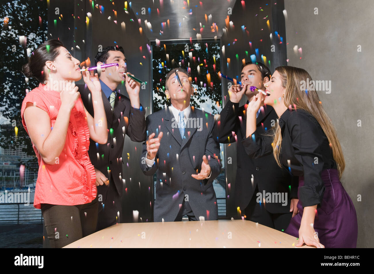 Business executives enjoying a party in an office Stock Photo - Alamy