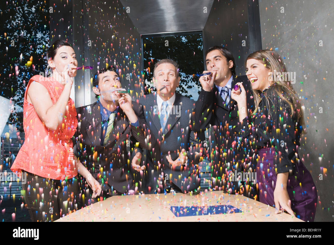 Business executives enjoying a party in an office Stock Photo - Alamy