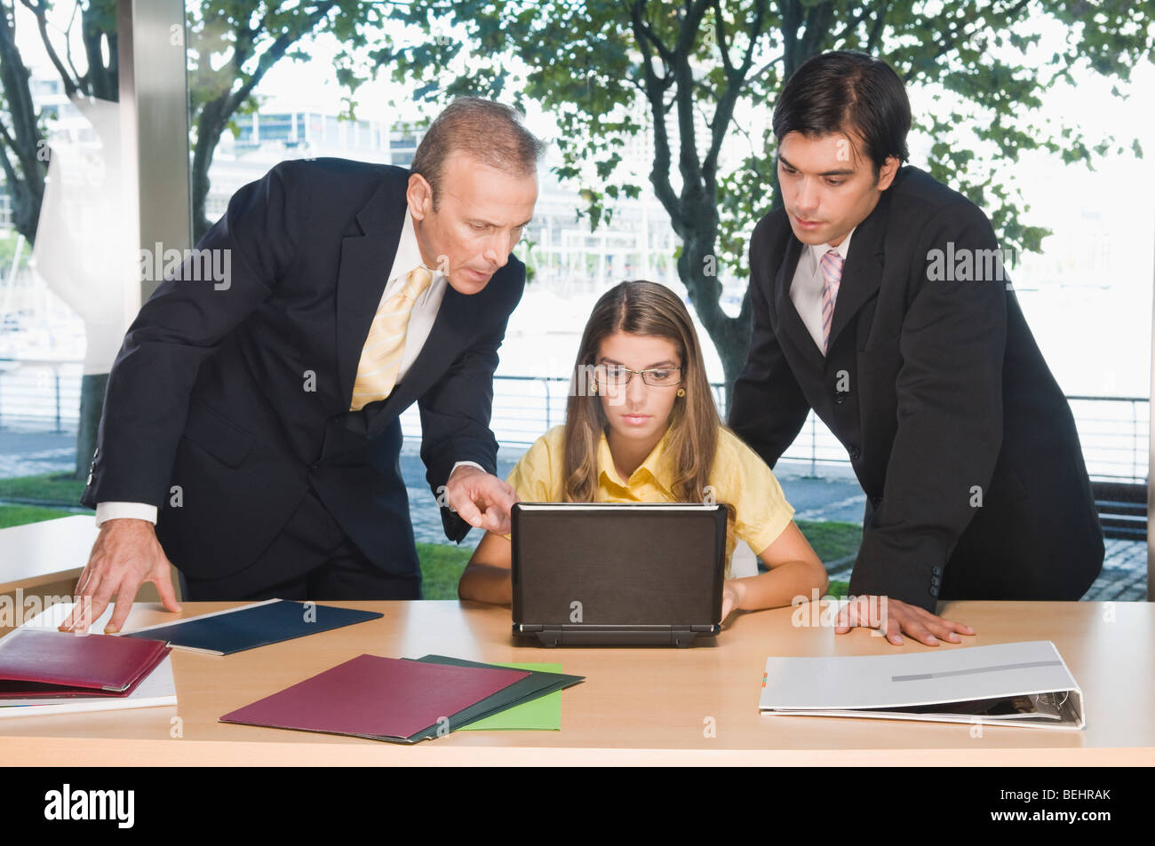 business executives working in an office Stock Photo - Alamy