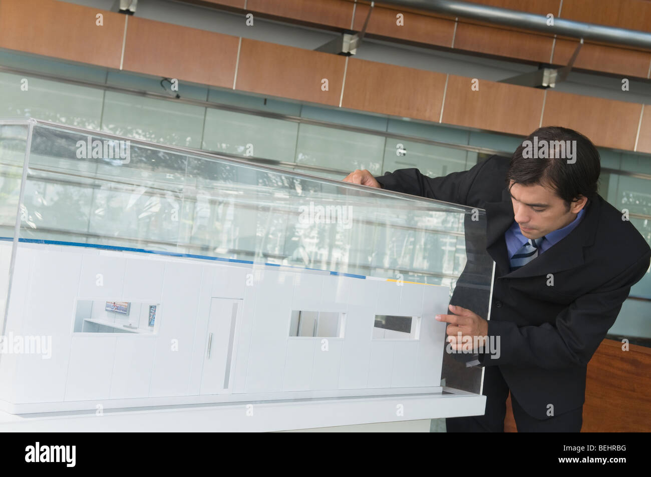 Businessman checking glass model hi-res stock photography and images ...