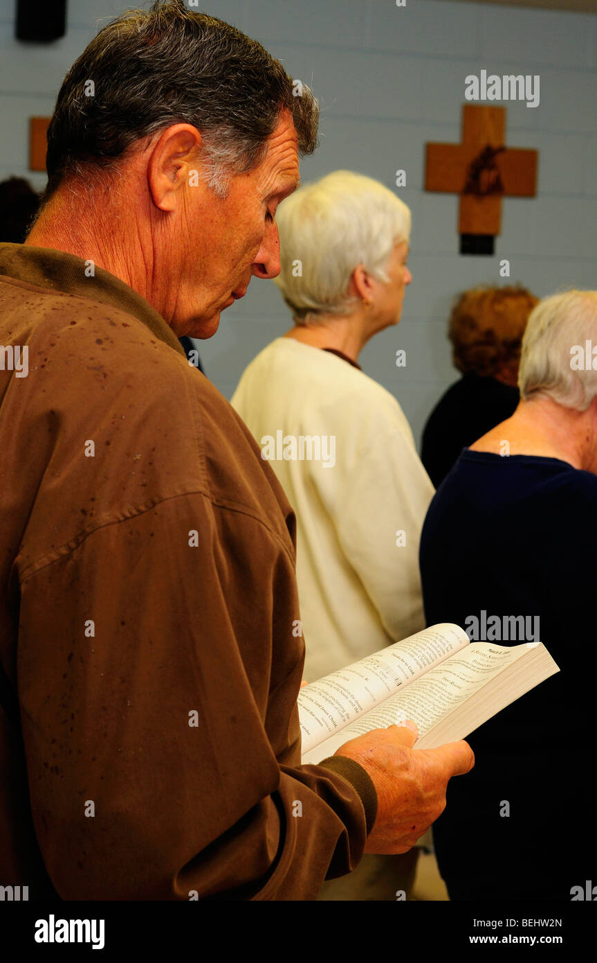 A parishioner at a Catholic church Stock Photo - Alamy