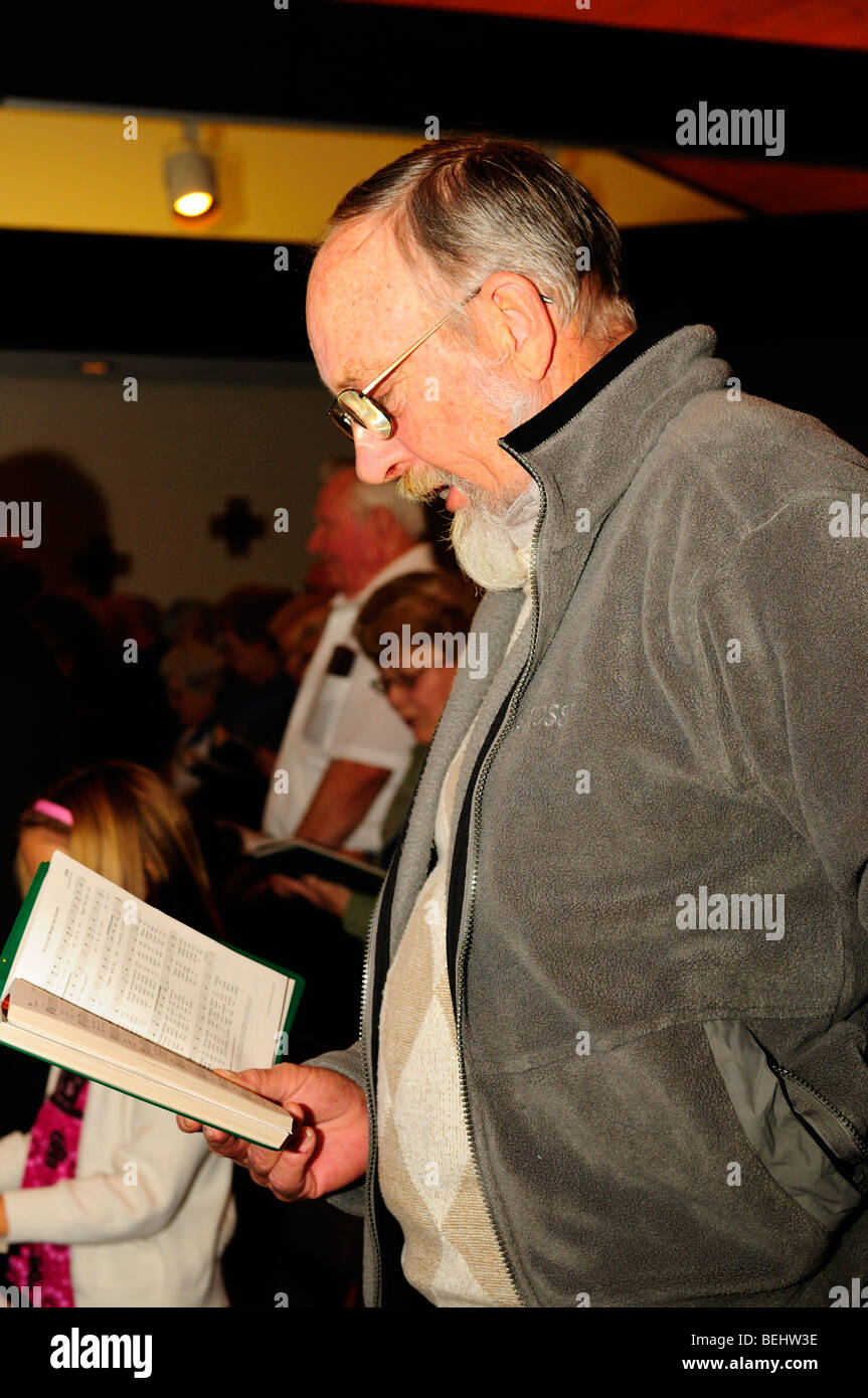 A man at a Catholic parish church Stock Photo - Alamy