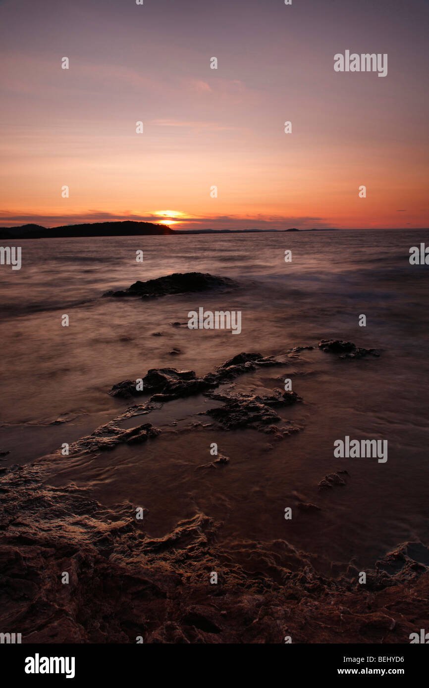 Dramatic Lake Superior summer orange sunset in Michigan USA from above ...