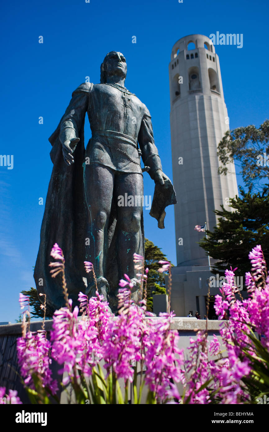 A statue of Christopher Columbus in front of Coit Tower in San ...