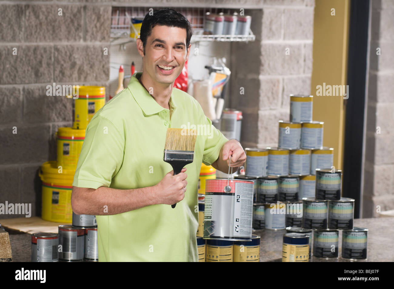 Man customer holding paint hi-res stock photography and images - Alamy