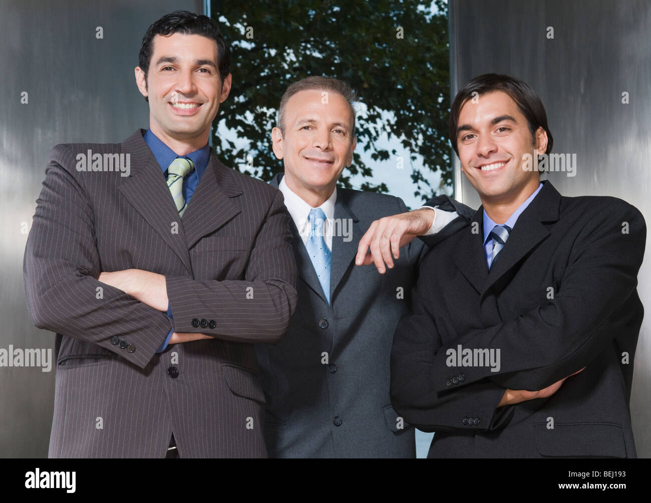 Standing looking smiling place of work authority hi-res stock ...