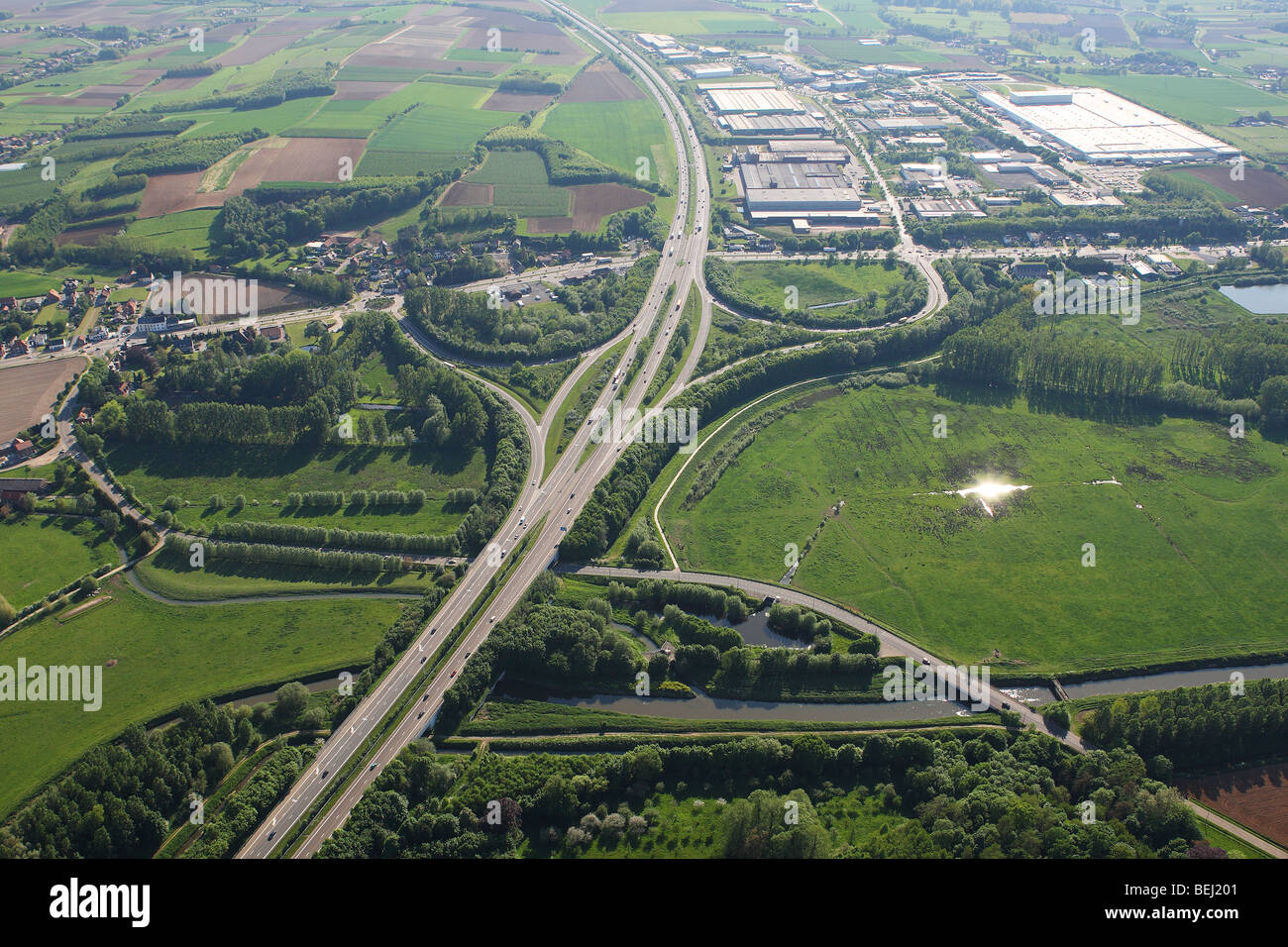Traffic junction, entrance and exit of highway from the air, Belgium ...