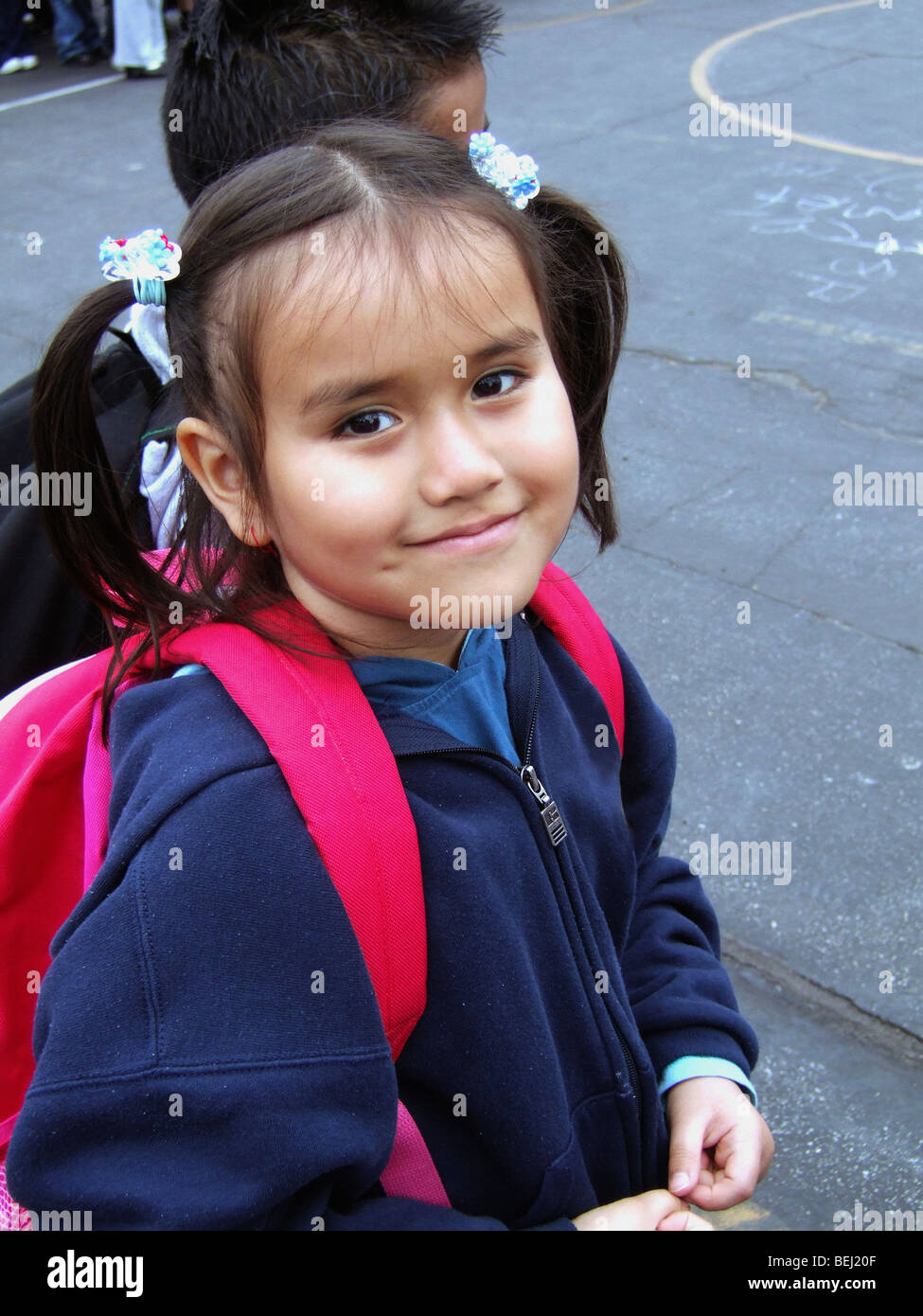 Female student wearing backpack Stock Photo - Alamy