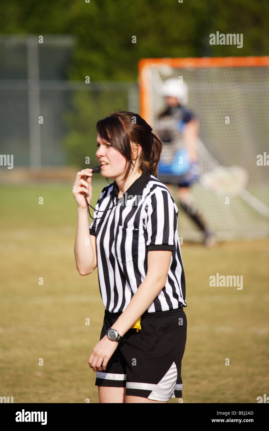 FEMALE REFEREE KEEPS AN EYE ON THE ACTION HIGH SCHOOL GIRLS LACROSSE ...