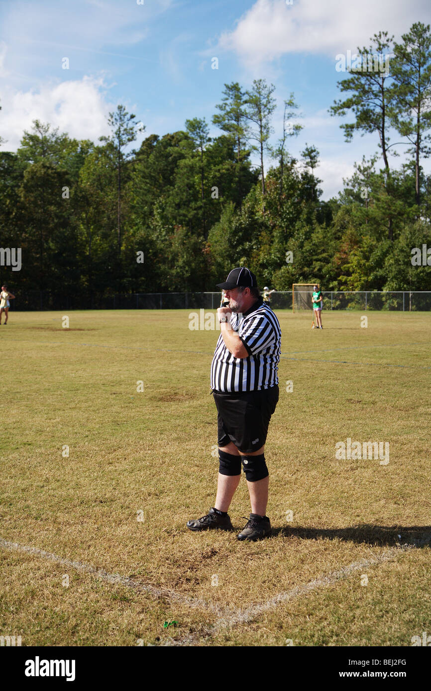 REFEREE KEEPING AN EYE ON THE ACTION HIGH SCHOOL GIRLS LACROSSE RICHARD ...