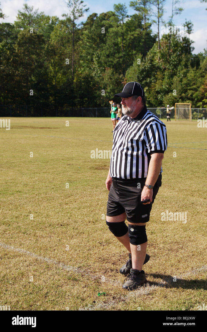 REFEREE KEEPING AN EYE ON THE ACTION HIGH SCHOOL GIRLS LACROSSE RICHARD ...