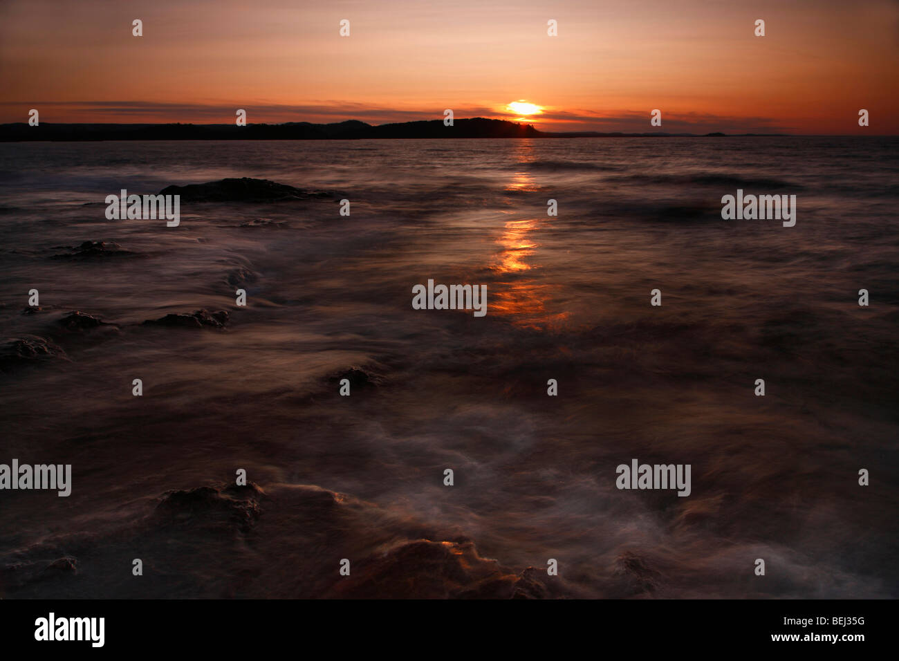 Dramatic Lake Superior summer sunset in Michigan USA nobody from above ...