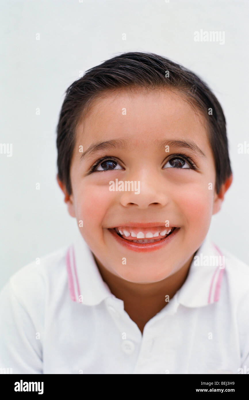 Close-up of a boy looking up and smiling, Zacatecas, Mexico Stock Photo ...
