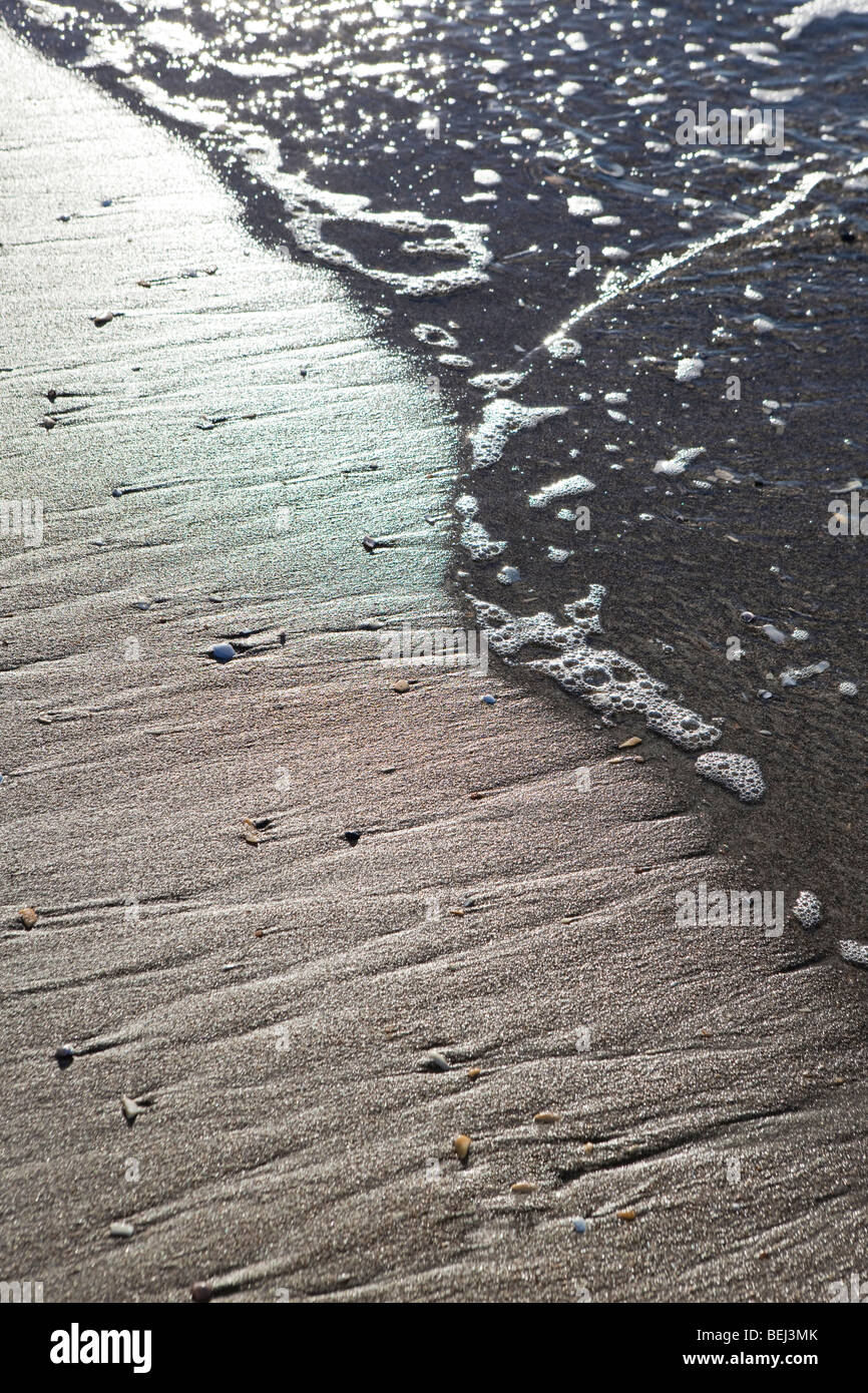 Water washing up on beach hi-res stock photography and images - Alamy
