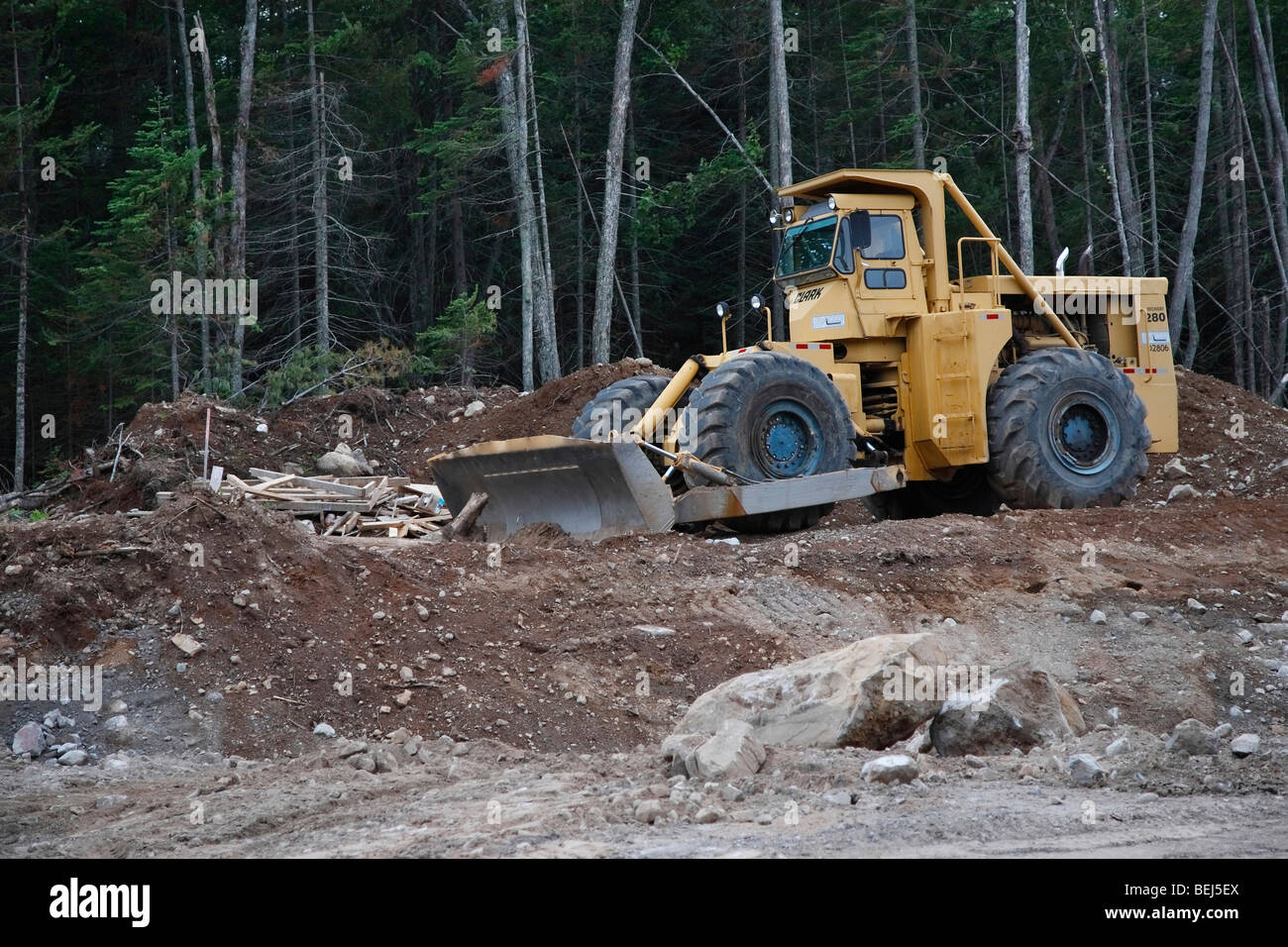 Backhoe loader in the forest of Upper Peninsula Michigan MI USA US ...