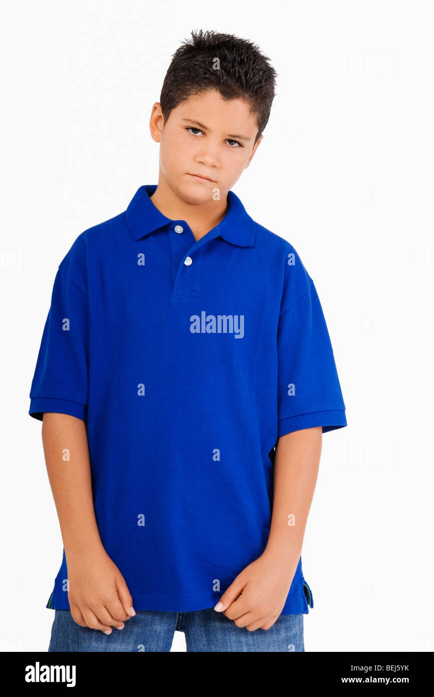 Portrait of a boy looking serious Stock Photo - Alamy