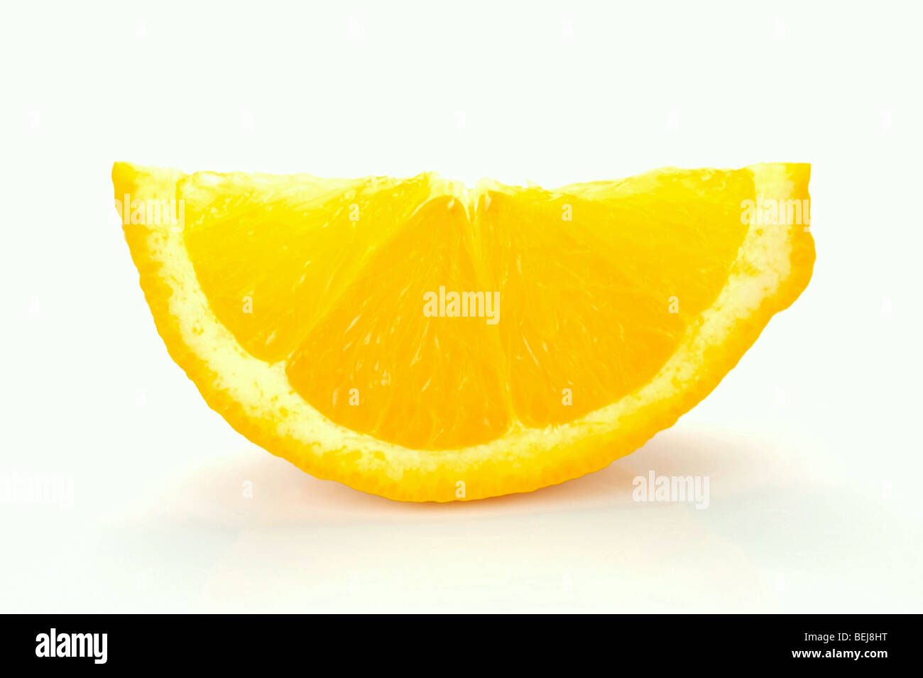 Orange quarters isolated against a white background Stock Photo - Alamy