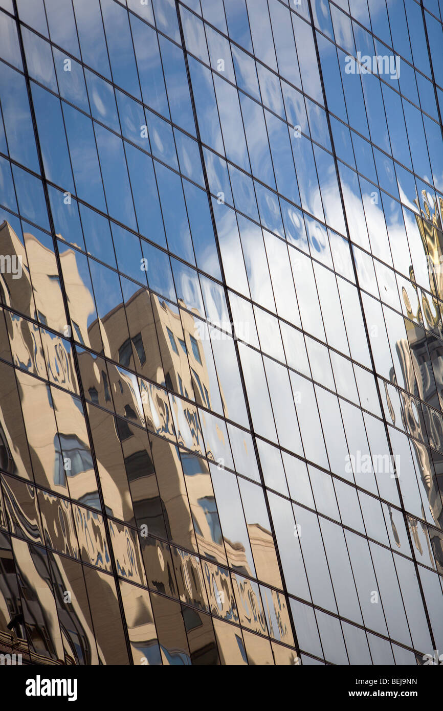 Reflection of a building on the window glass of an office building ...