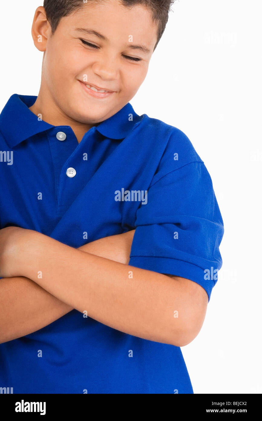 Close-up of a boy with his arms crossed Stock Photo - Alamy