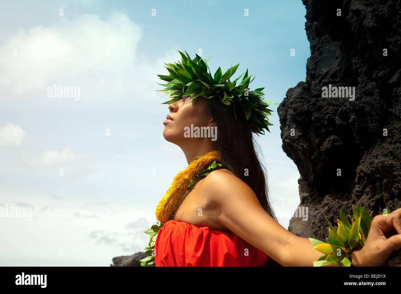 Young Hawaiian woman wearing traditional hula attire Stock Photo - Alamy