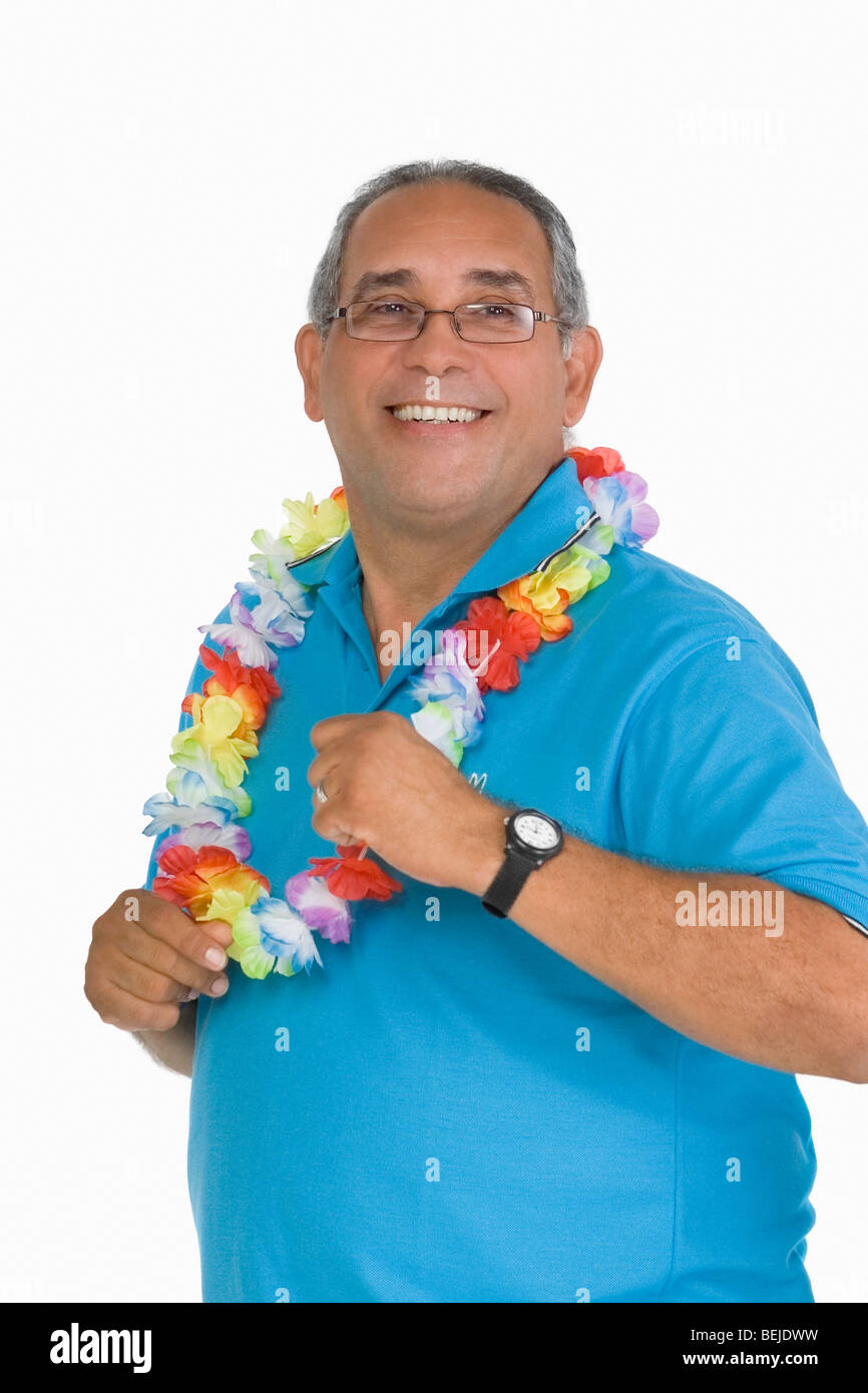 Man wearing garland flowers around hi-res stock photography and images ...