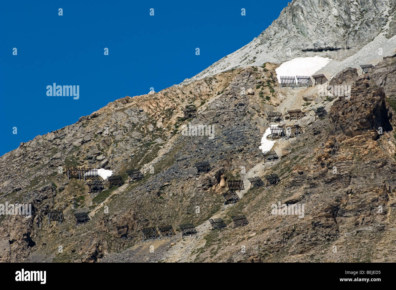 Buttresses / snow fences on mountain slope to avoid avalanches in the ...