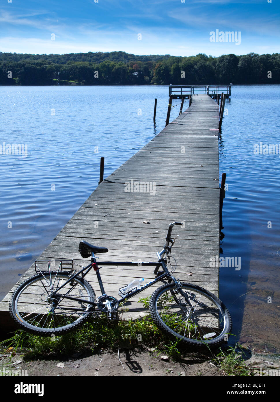 Bicycle on a dock Stock Photo - Alamy
