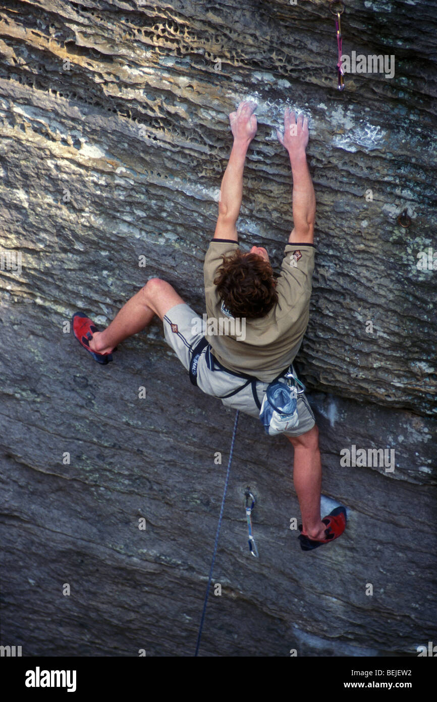 Rock climber climbing in sandstone cliff Wanterbaach, Berdorf, Little ...