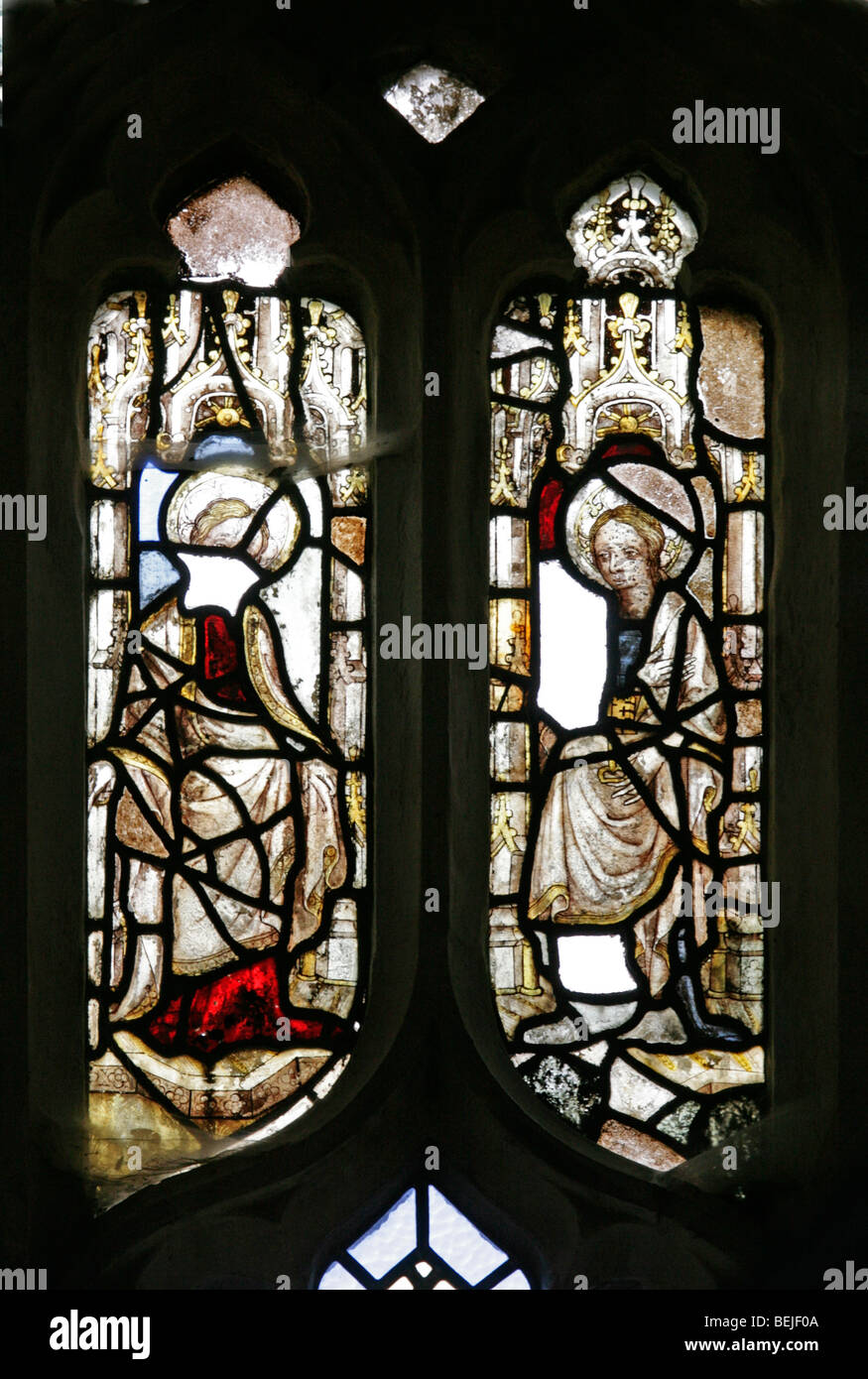 Details of the medieval stained glass window depicting St Sithe, left ...