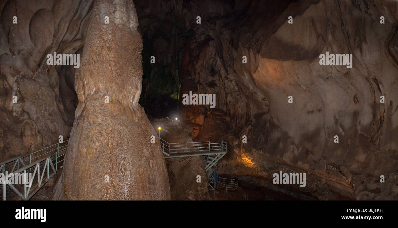 Gua Tempurung cave interior showing large stalacmite and walkways Stock ...