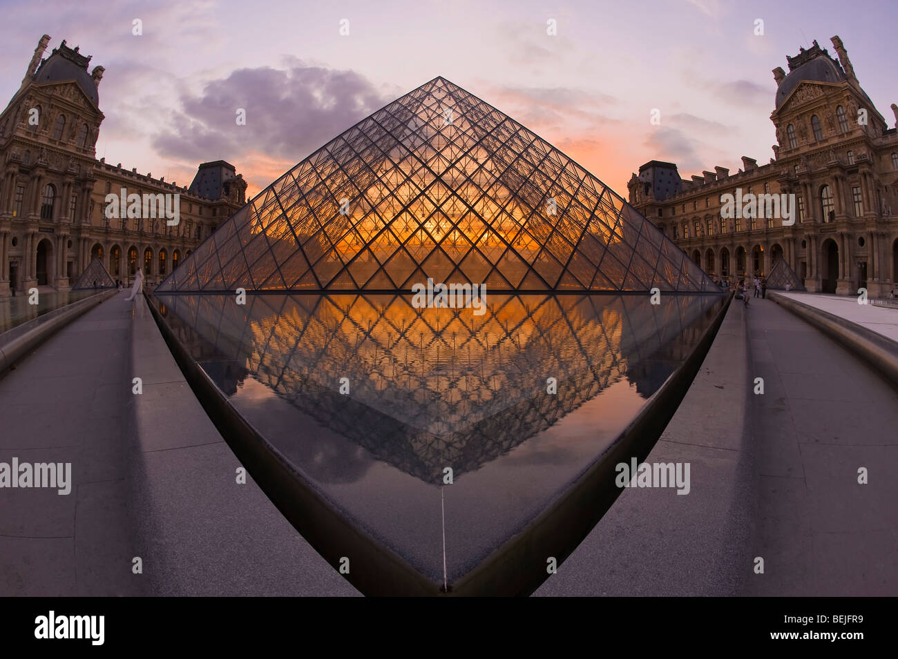 Louvre Pyramide at sunset, Paris, France Stock Photo - Alamy