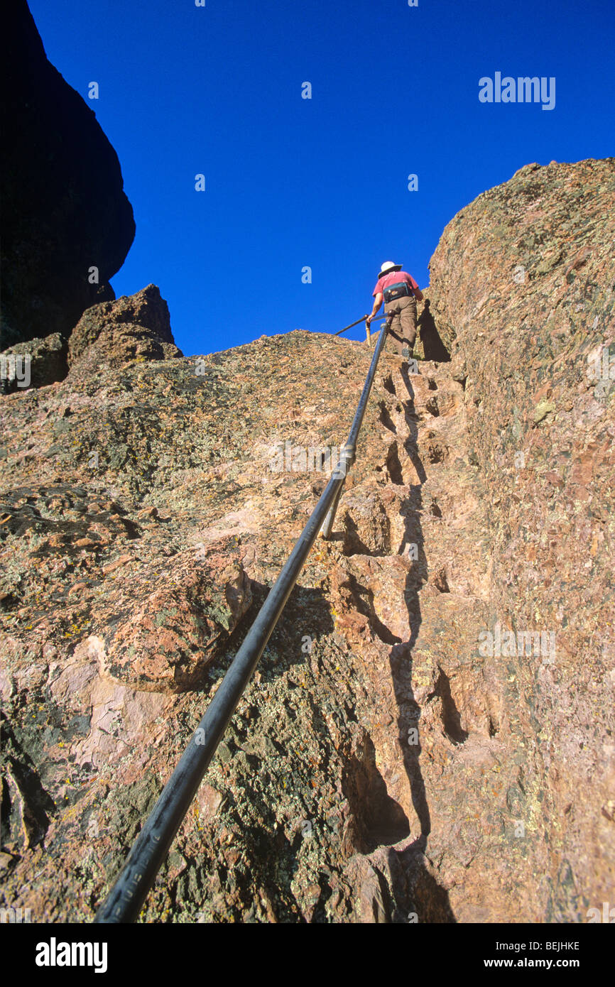 Hiking at Pinnacles National Monument, hiker using handrail on steep ...