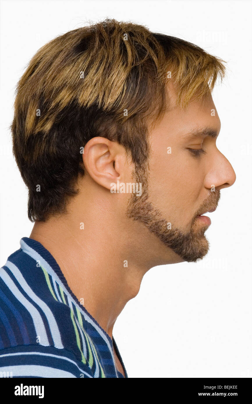 Side profile of a mid adult man thinking Stock Photo - Alamy