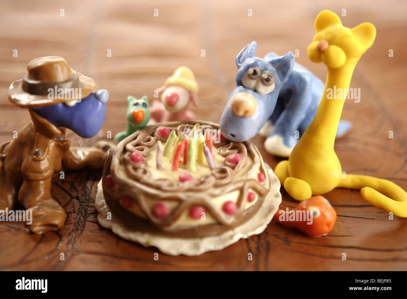 Toy plasticine happy birthday cake isolated over white background Stock ...